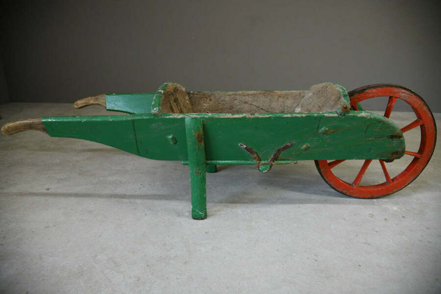 Vintage wooden wheelbarrow for sale store
