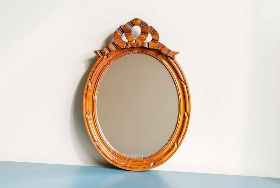 fancy bow oval mirror